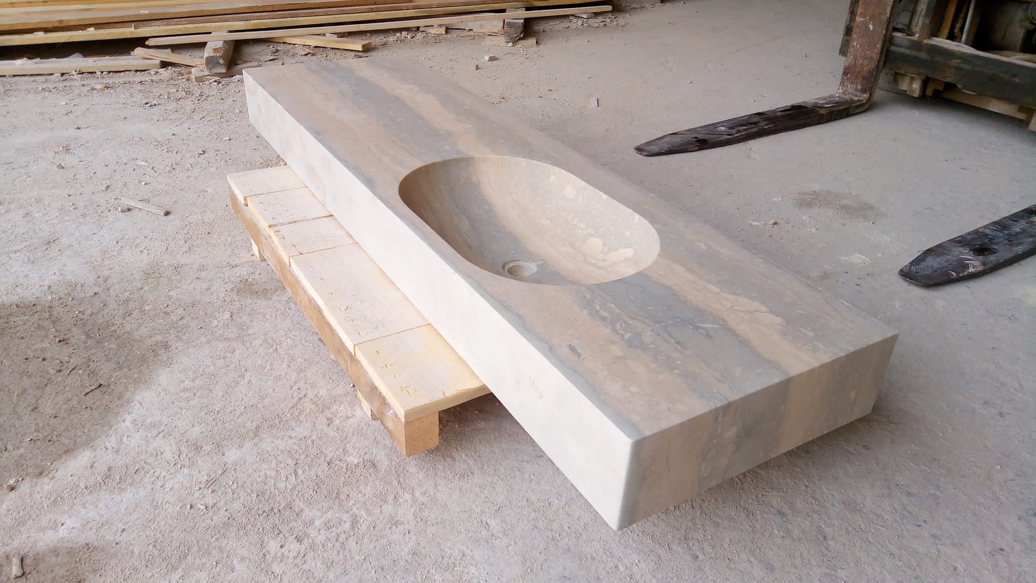 Fresh from the Block - Carved Basins in Roman Silver Light Travertine ...